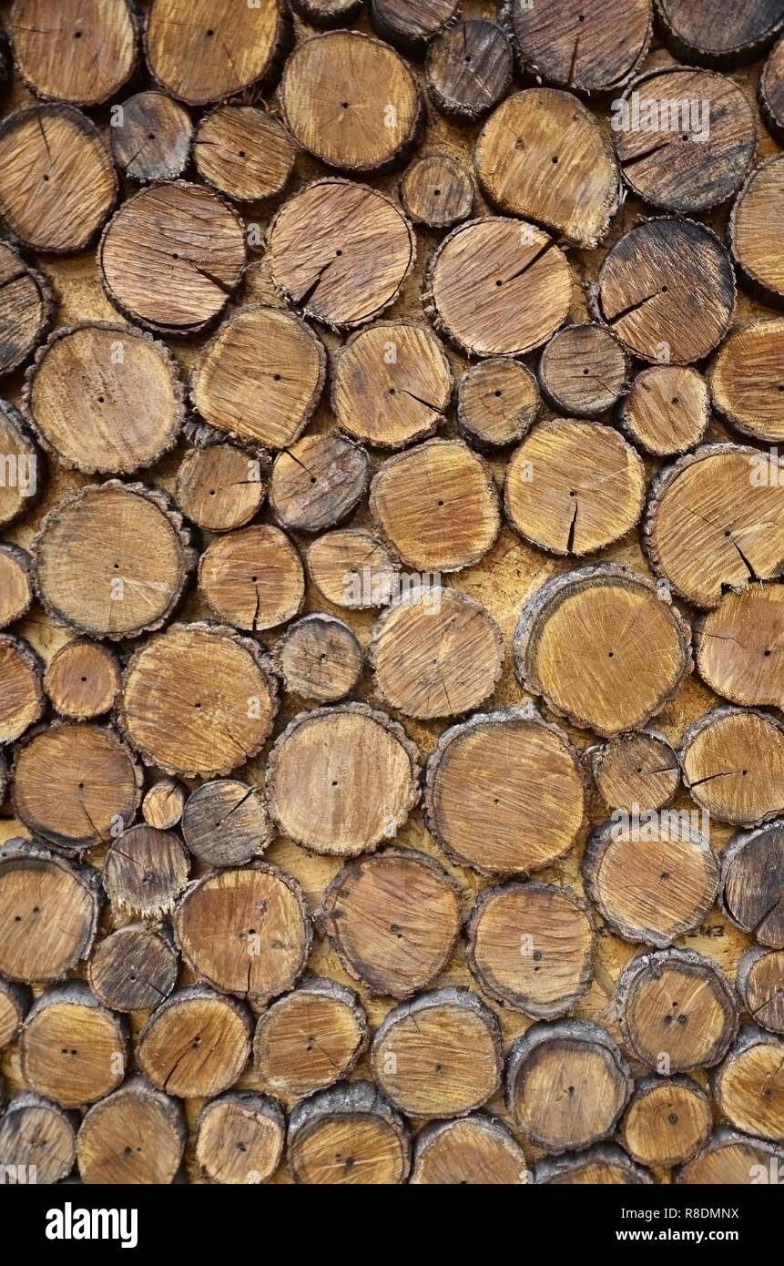 Decorative fence of wooden blocks. Rare wooden handmade wall contains ...