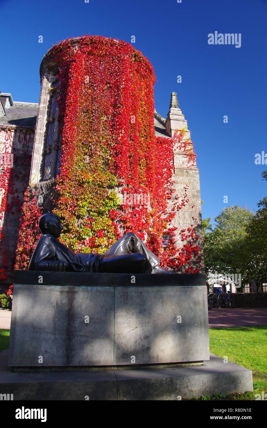 Lounging Young Man Statue by New Kings Lecture Building, Festooned in ...