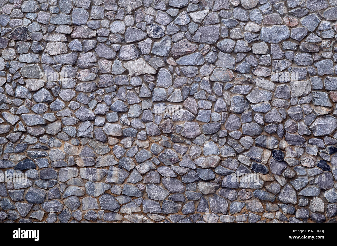 Stone wall background - building feature. Texture of thick and strong ...