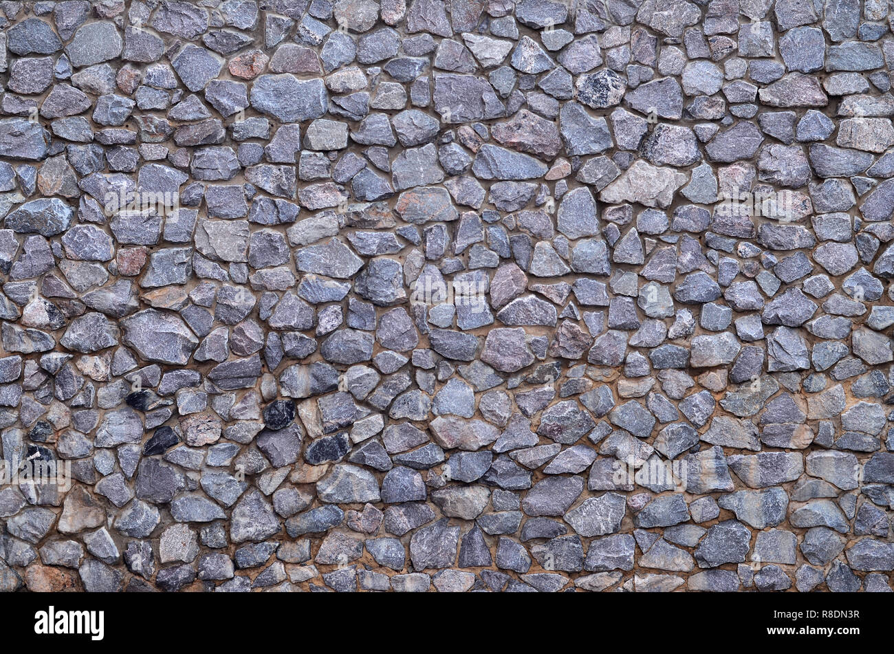 Stone wall background - building feature. Texture of thick and strong ...