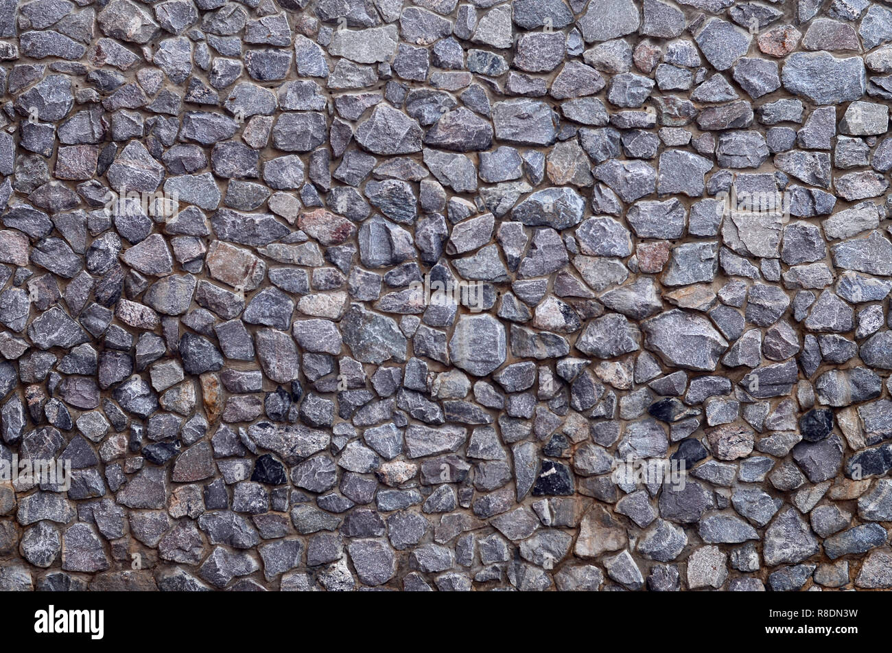 Stone wall background - building feature. Texture of thick and strong ...