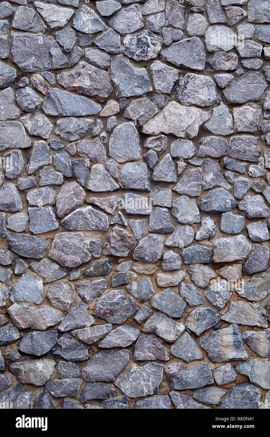 Stone wall background - building feature. Texture of thick and strong ...