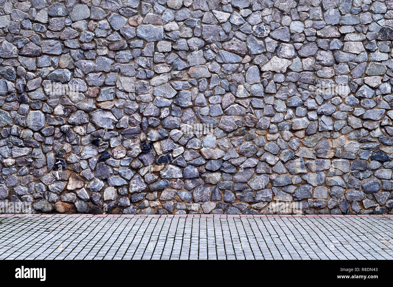 Stone wall background - building feature. Texture of thick and strong ...