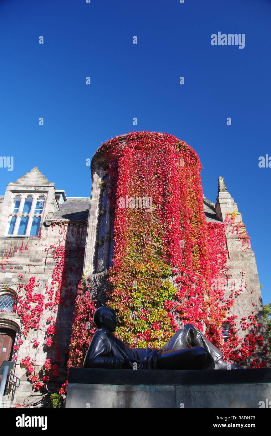Lounging Young Man Statue by New Kings Lecture Building, Festooned in ...