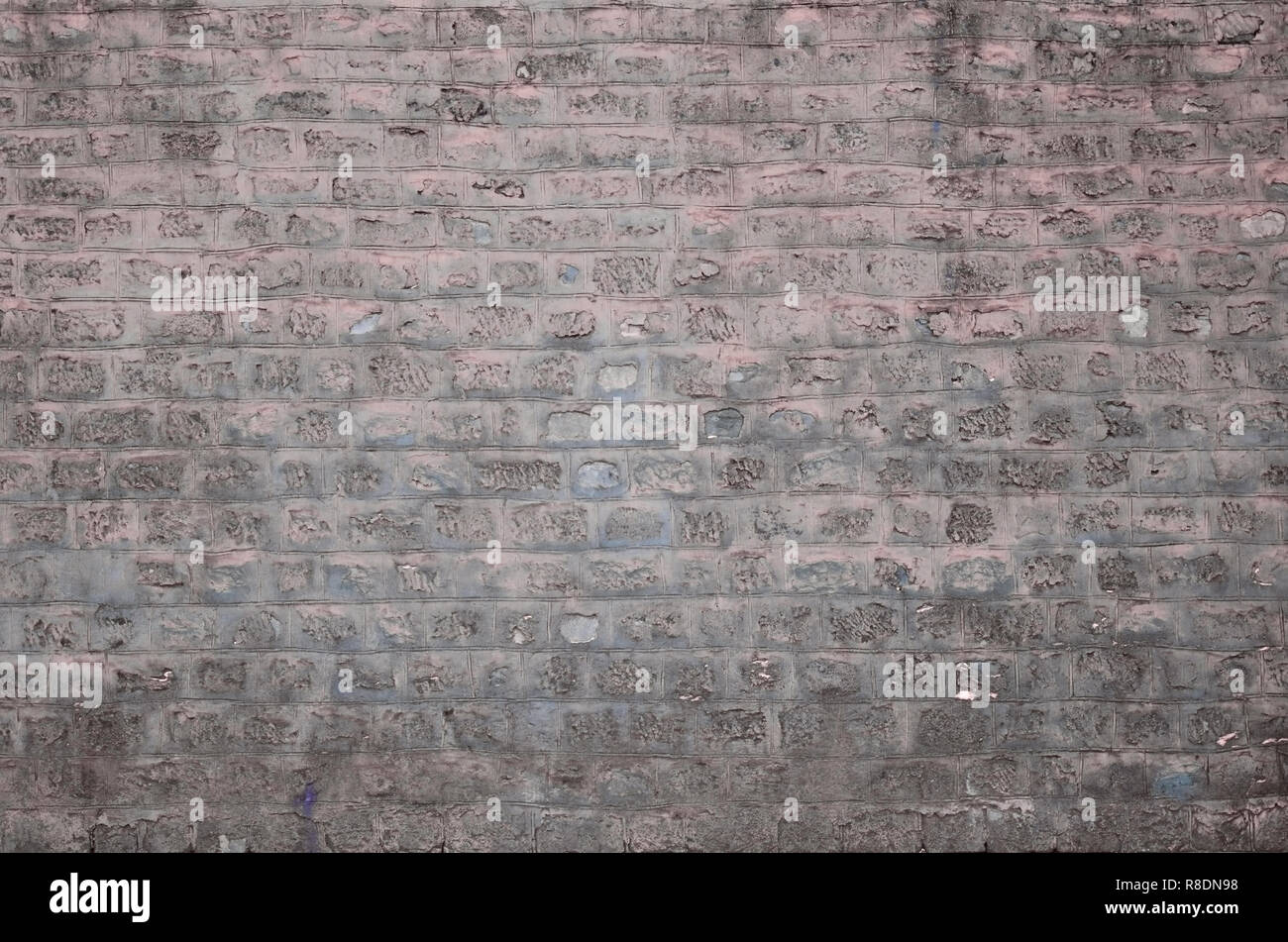 Weathered stained old block wall background. Texture of an old wall of ...