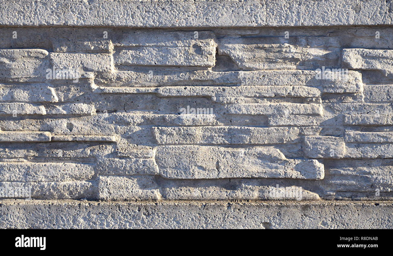 Stone fence texture - building feature. Texture of concrete fence with ...