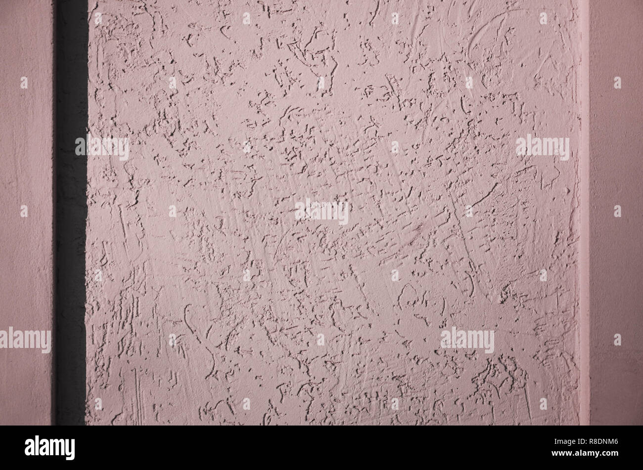 Concrete wall texture with colored plaster. Beautiful design facade painted plaster walls with ...