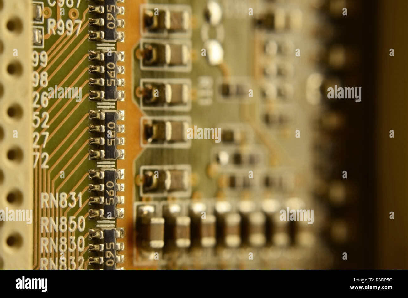 Close up of colored micro circuit board. Abstract technology background ...