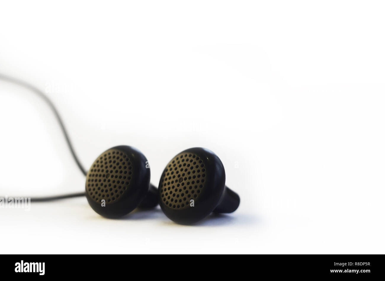 Small headphones isolated on a white background. Music listening ...