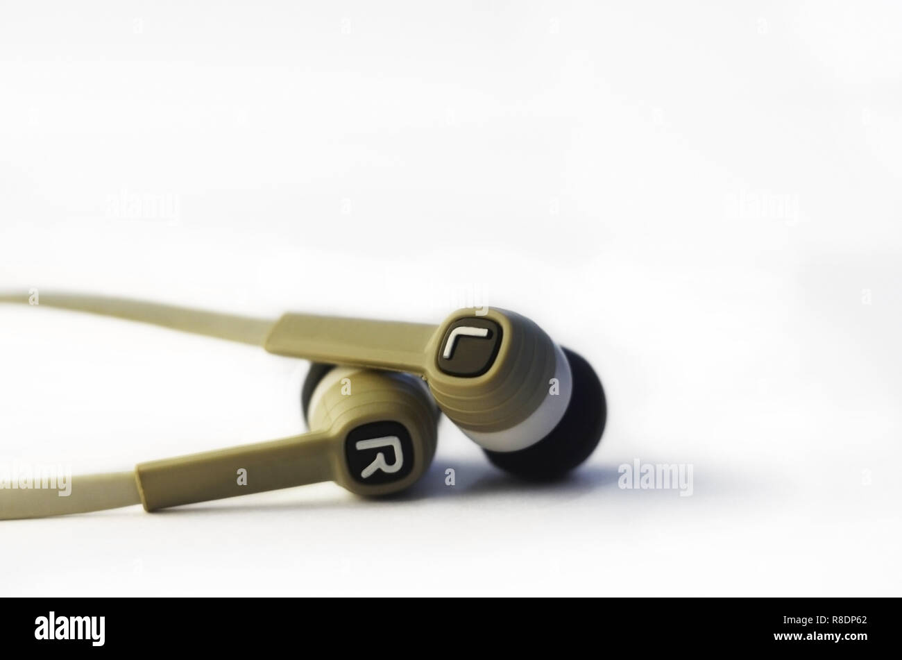 Small headphones isolated on a white background. Music listening ...