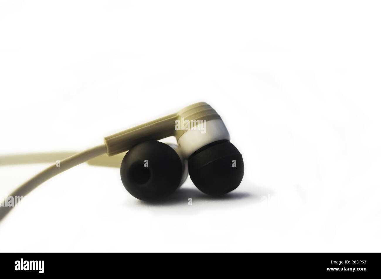 Small headphones isolated on a white background. Music listening ...