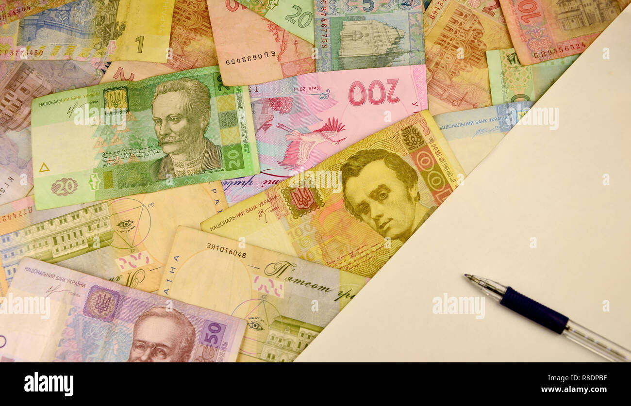 A huge number of Ukrainian banknotes. Ukrainian money with a white ...
