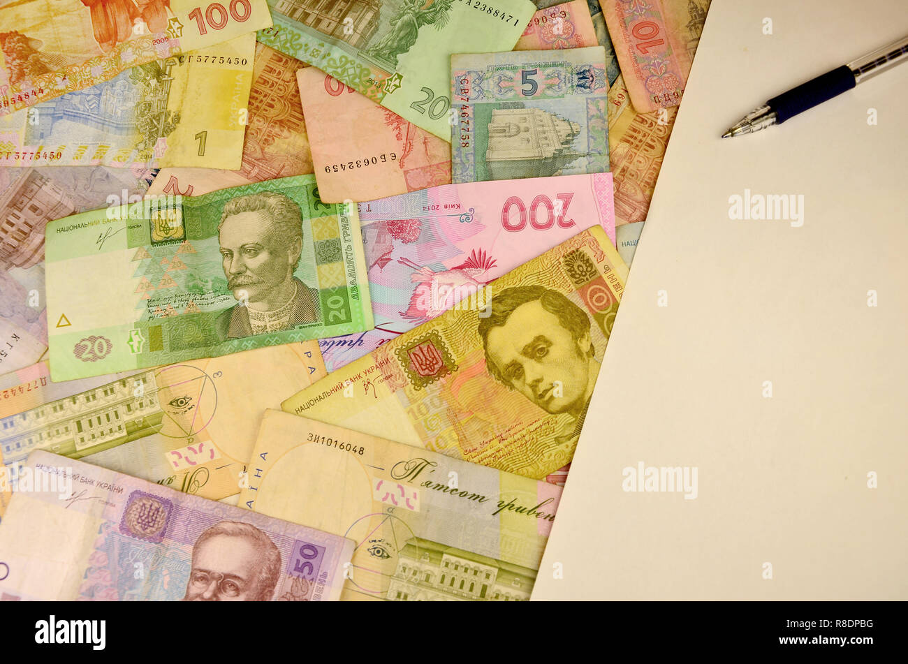 A huge number of Ukrainian banknotes. Ukrainian money with a white ...