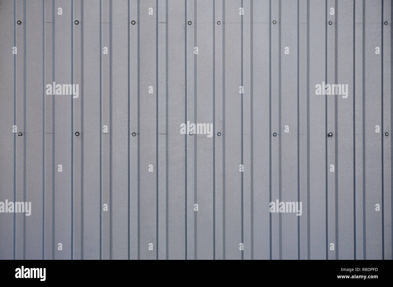 Siding, metal panels texture closeup in the daytime outdoors. Metal ...