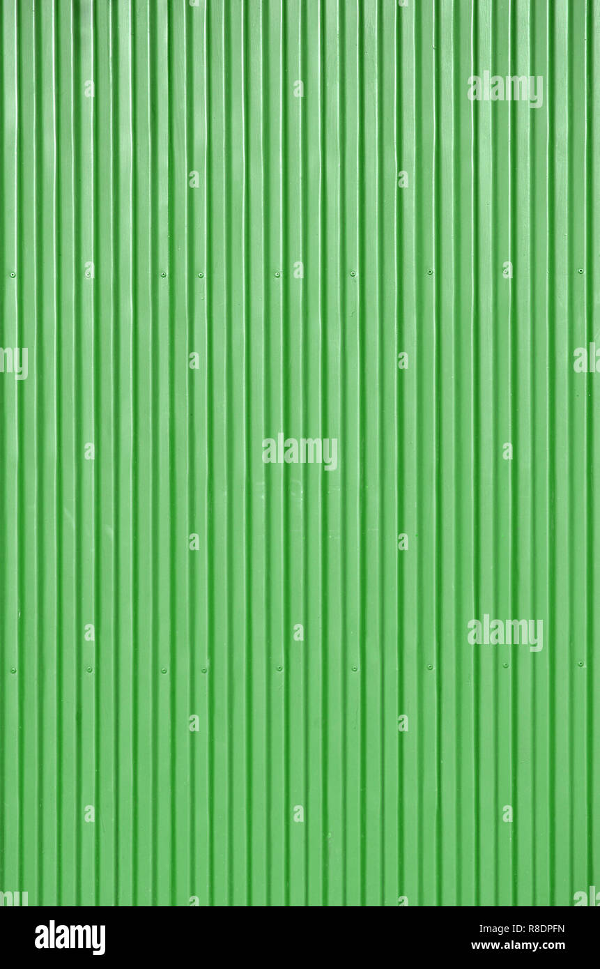 Siding, metal panels texture closeup in the daytime outdoors. Metal ...