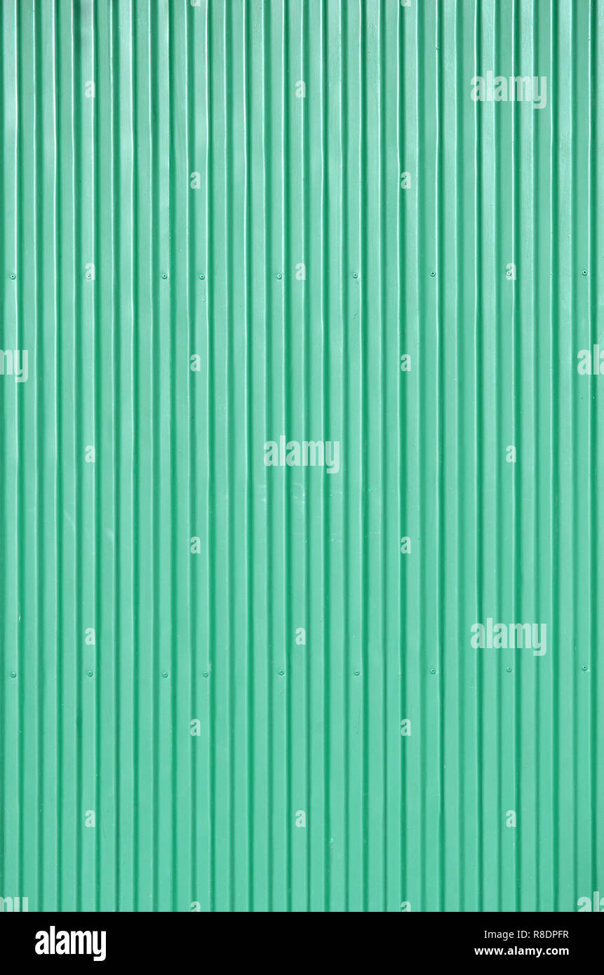 Siding, metal panels texture closeup in the daytime outdoors. Metal ...