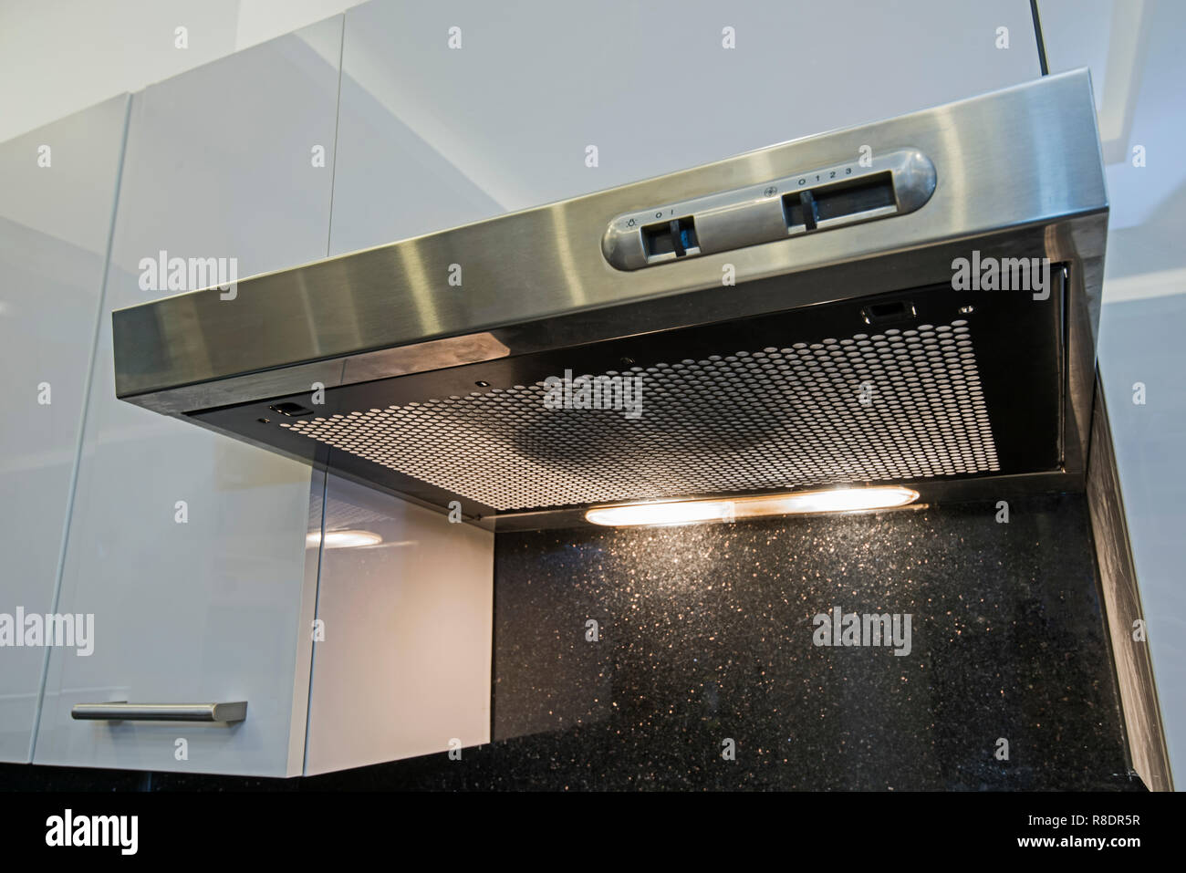 Interior design decor of modern kitchen showing extractor fan appliance ...