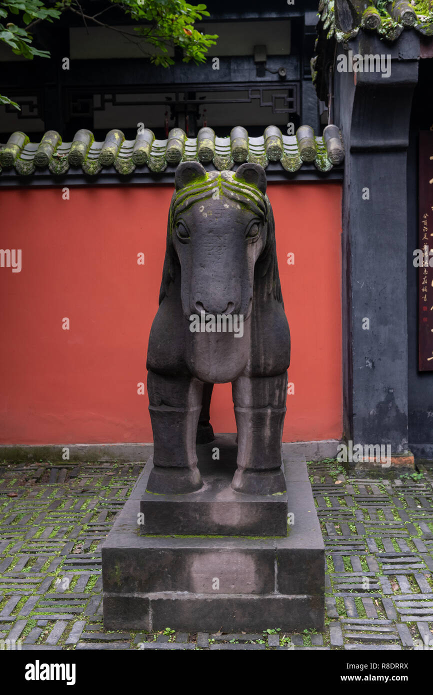 Wuhou Temple - courtyard stature of horse - red wall background Stock ...