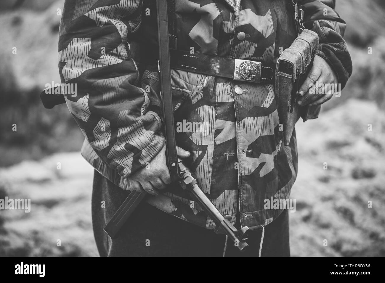 Re-enactor Dressed As World War II German Soldier Holding Sub-machine ...