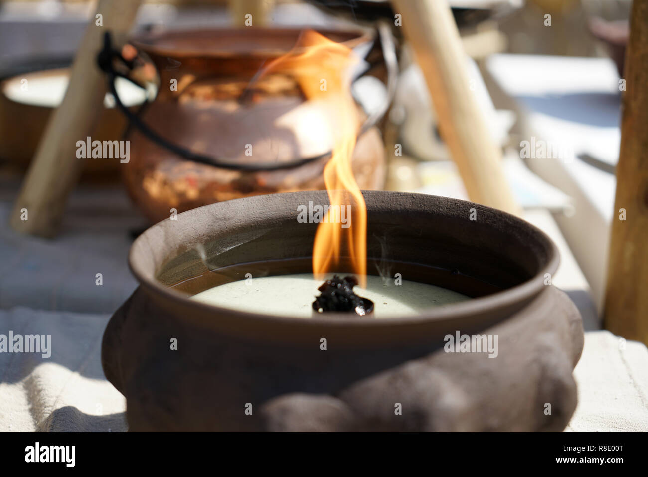 Oil lamps are lighting fixtures that are fueled with oils Stock Photo ...