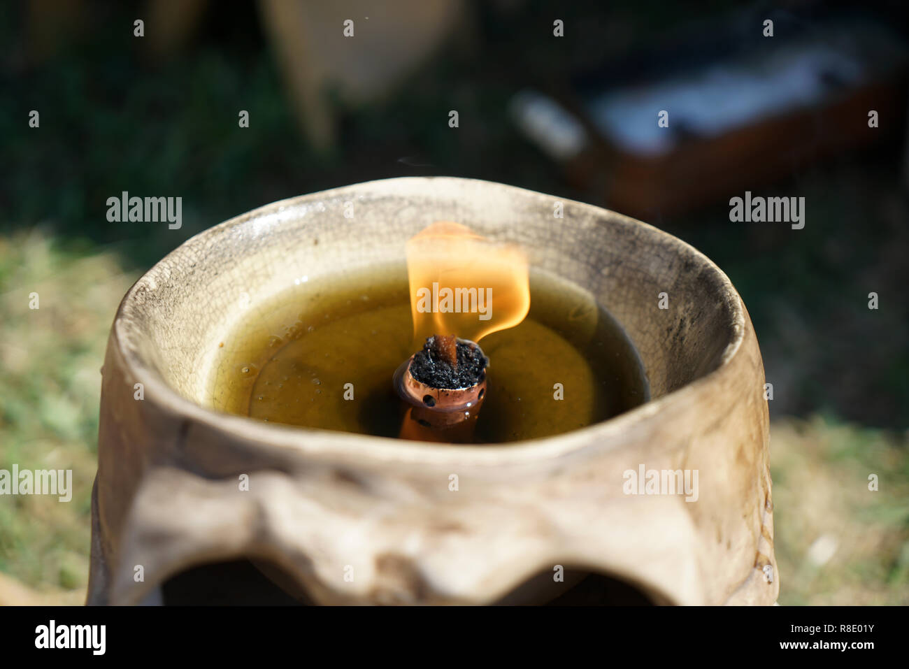 Oil lamps are lighting fixtures that are fueled with oils Stock Photo ...