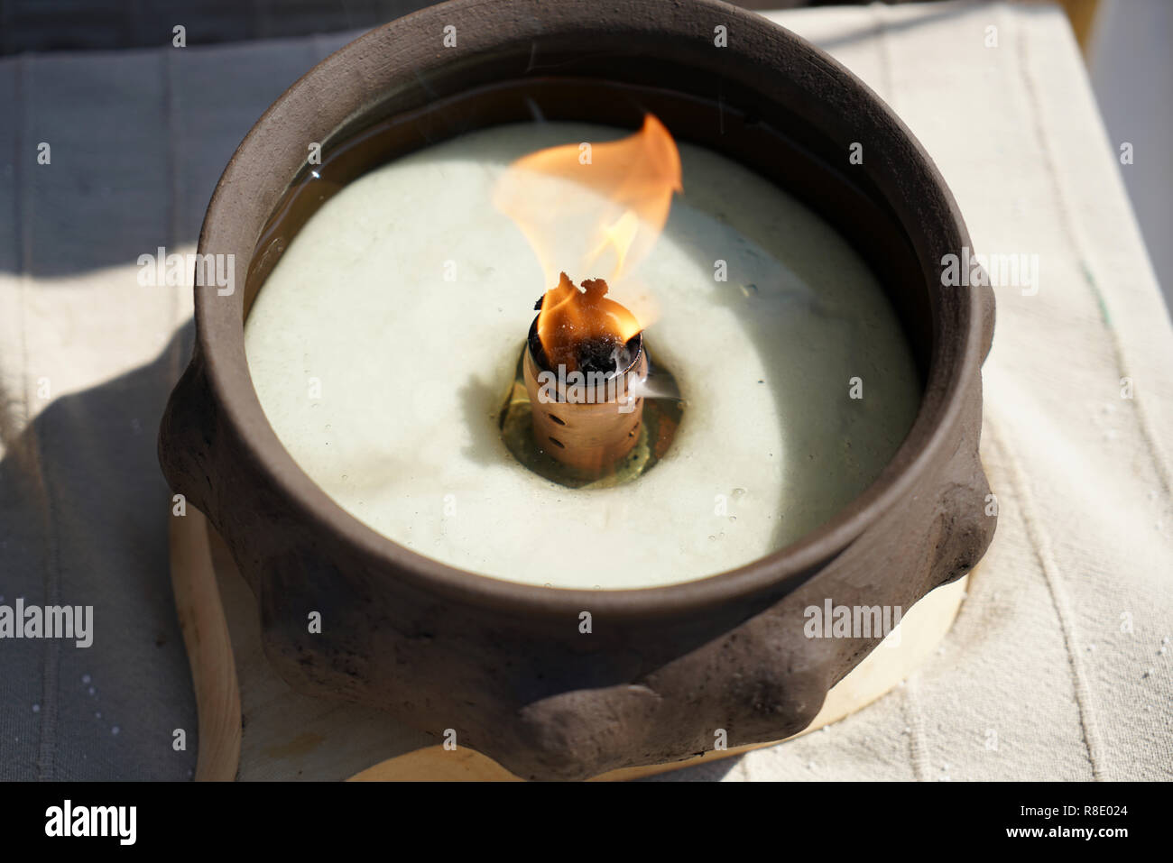 Oil lamps are lighting fixtures that are fueled with oils Stock Photo ...