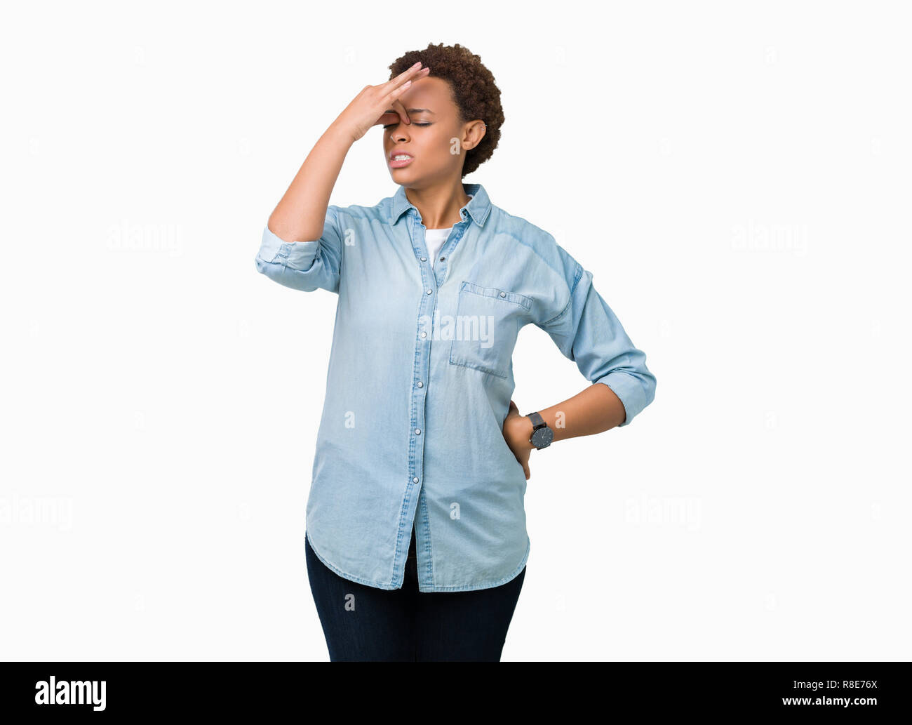 Young beautiful african american woman over isolated background tired ...