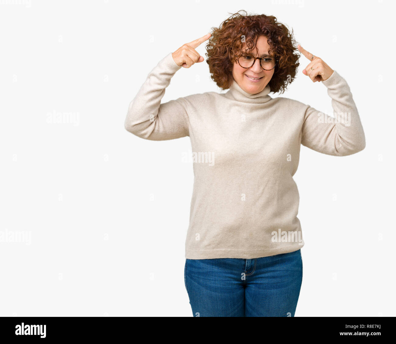 Beautiful middle ager senior woman wearing turtleneck sweater and ...