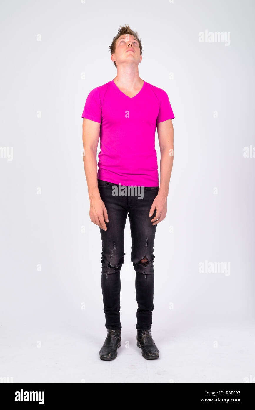 Full body shot of young handsome man looking up Stock Photo - Alamy