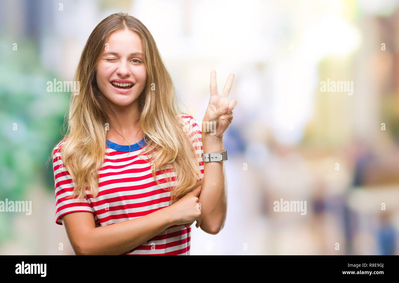 Hispanic beautiful woman winking face hi-res stock photography and ...