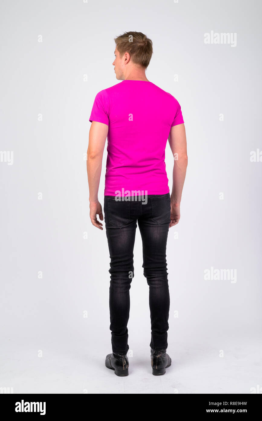 Full body shot rear view of young handsome man standing Stock Photo - Alamy