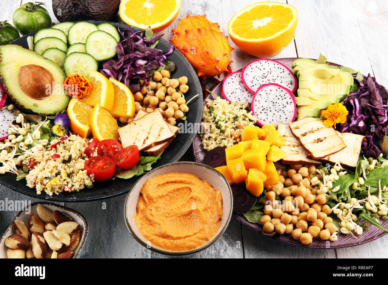 grilled tofu and dragon fruit buddha bowl with vegetable and humus ...
