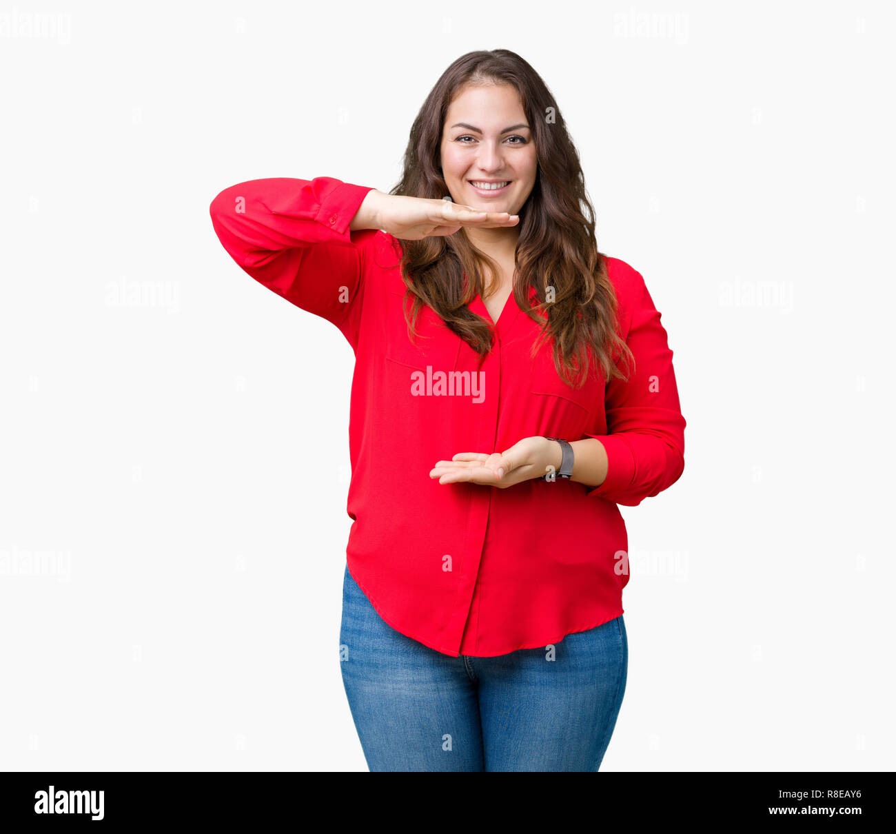 Beautiful plus size young business woman over isolated background ...
