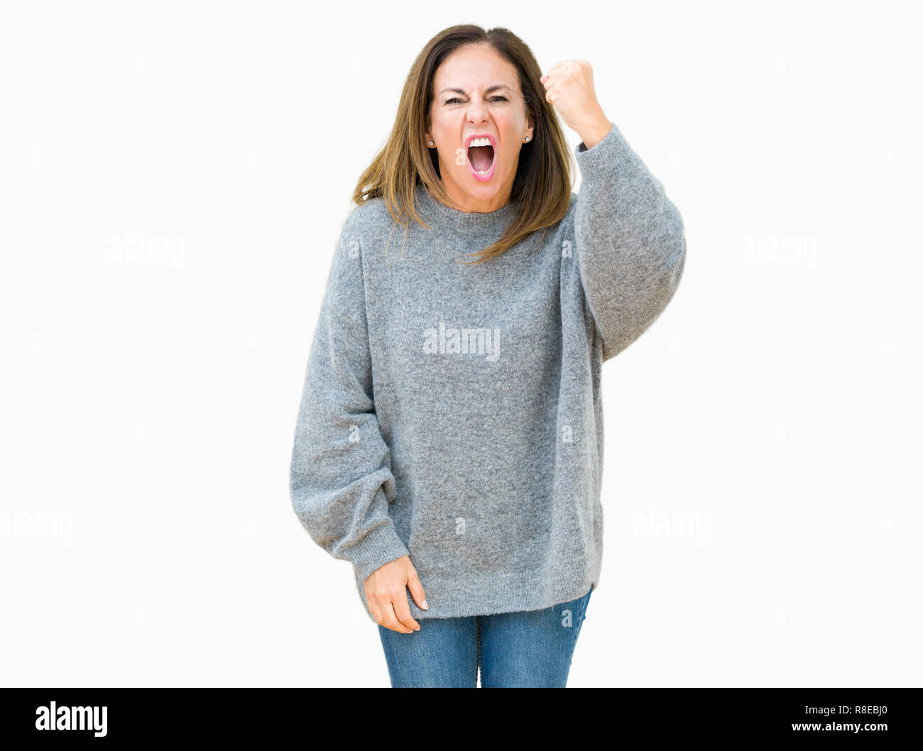 Beautiful middle age woman wearing winter sweater over isolated ...