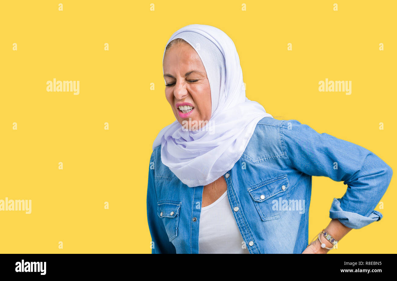 Middle age eastern arab woman wearing arabian hijab over isolated ...