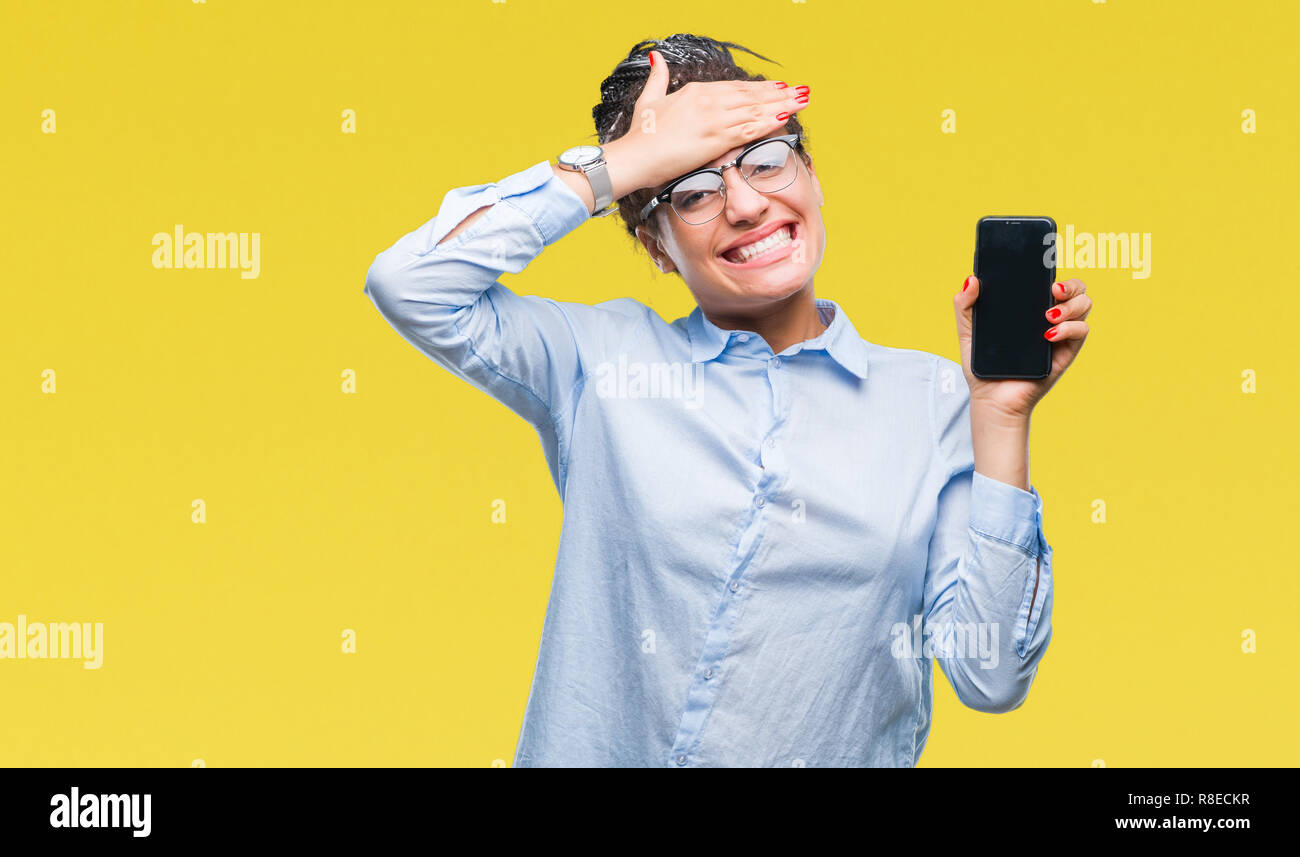 Young braided hair african american business girl showing screen of ...