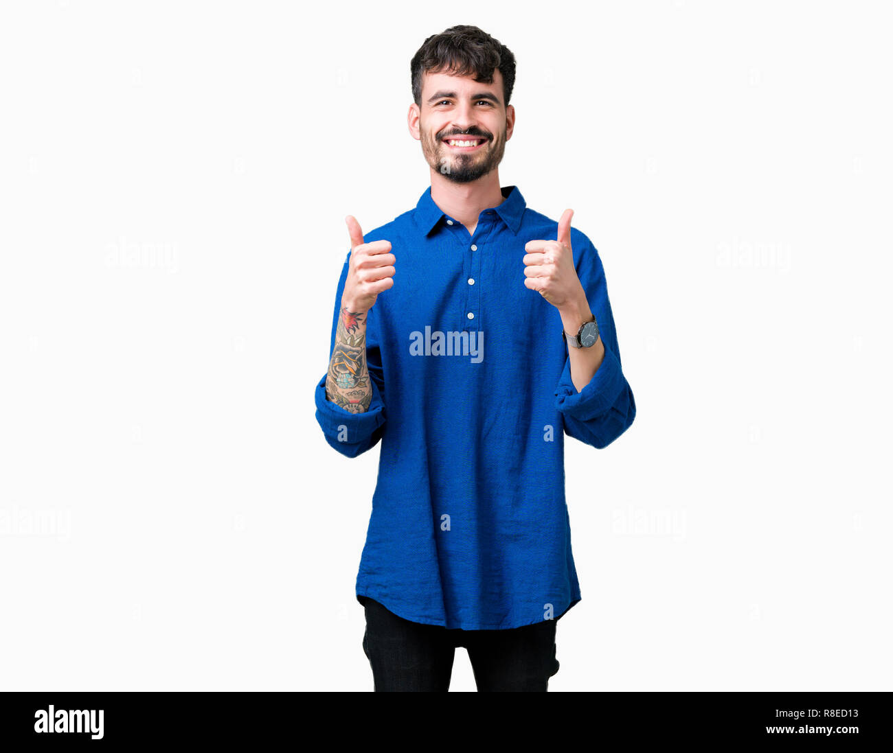 Young handsome man over isolated background success sign doing positive ...