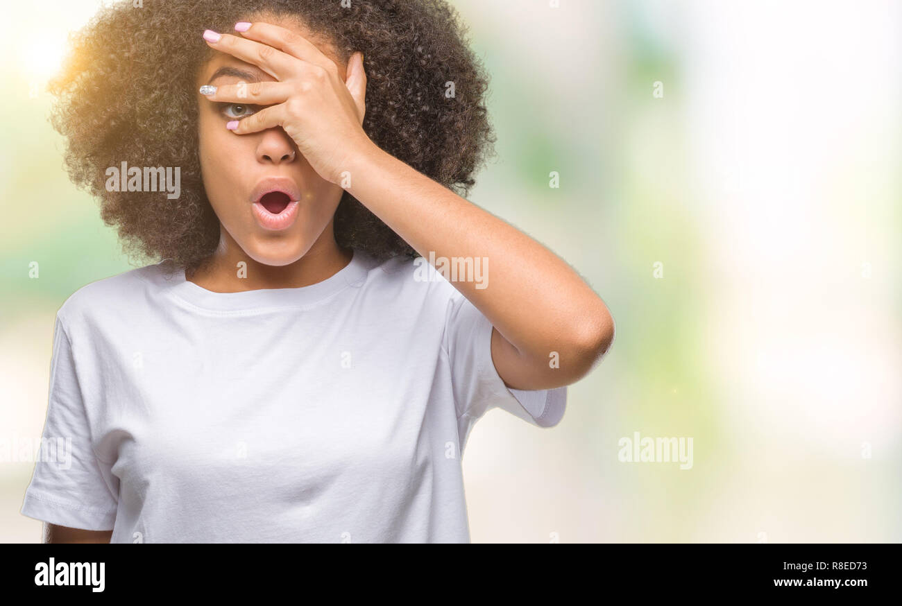 Hand over eyes peeking woman hi-res stock photography and images - Alamy
