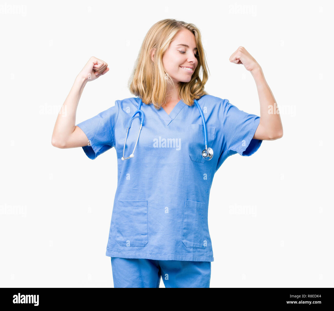 Beautiful young doctor woman wearing medical uniform over isolated ...
