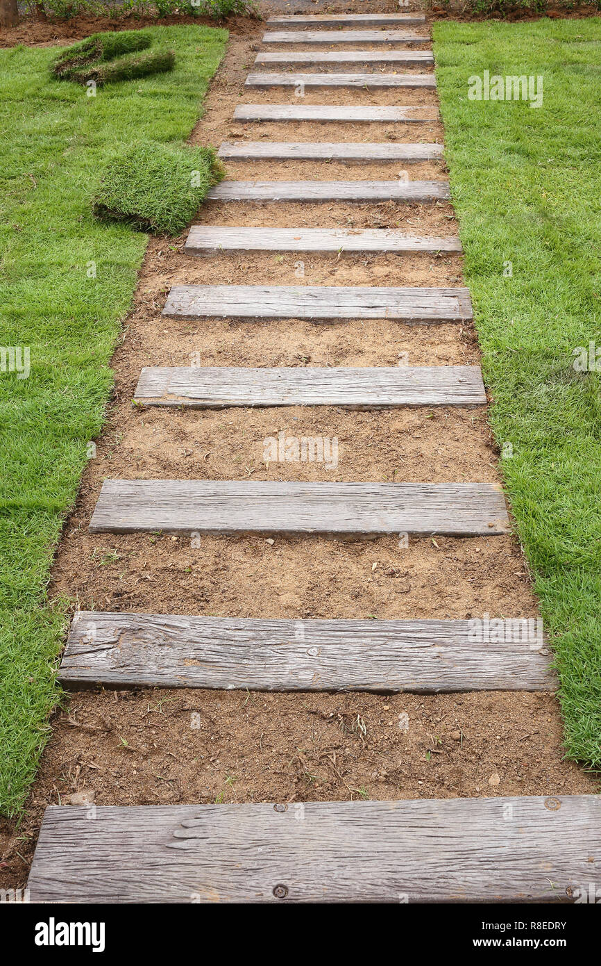 New grass, planting new sod grass in the garden Stock Photo - Alamy