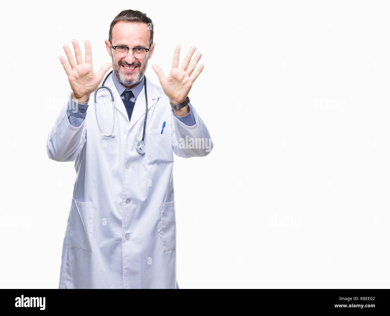 Middle age senior hoary doctor man wearing medical uniform isolated ...