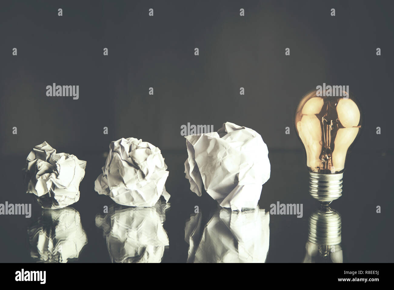 new idea concept with crumpled office paper Stock Photo - Alamy