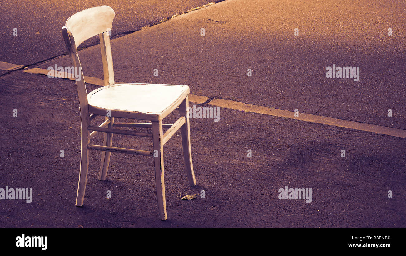 White Empty Wooden Chair On The Road With Copy Space Stock Photo - Alamy