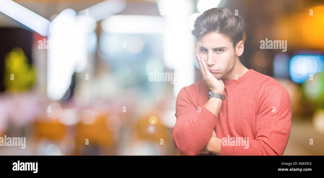 Young handsome man over isolated background thinking looking tired and ...
