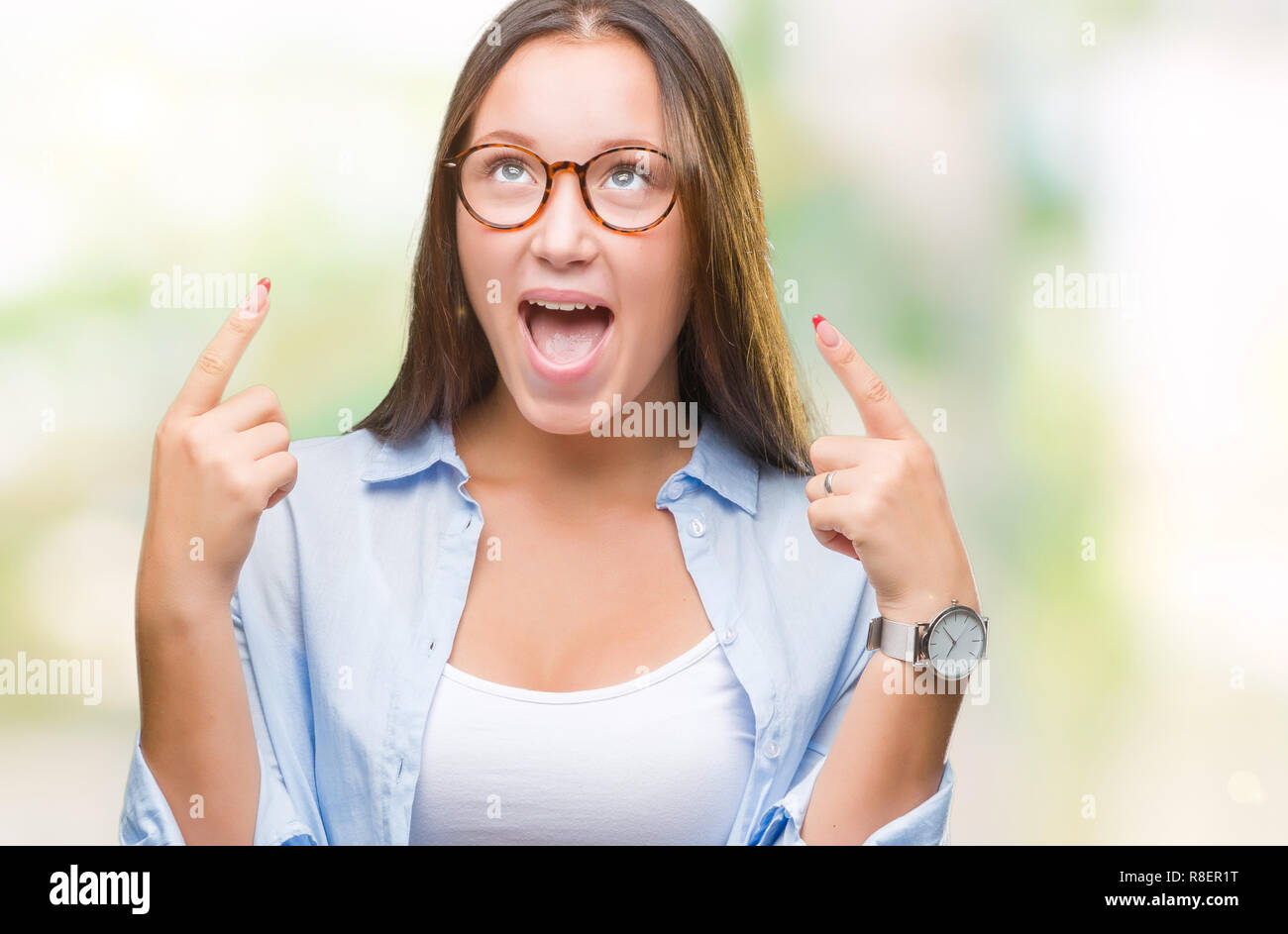 Young caucasian beautiful business woman wearing glasses over isolated ...