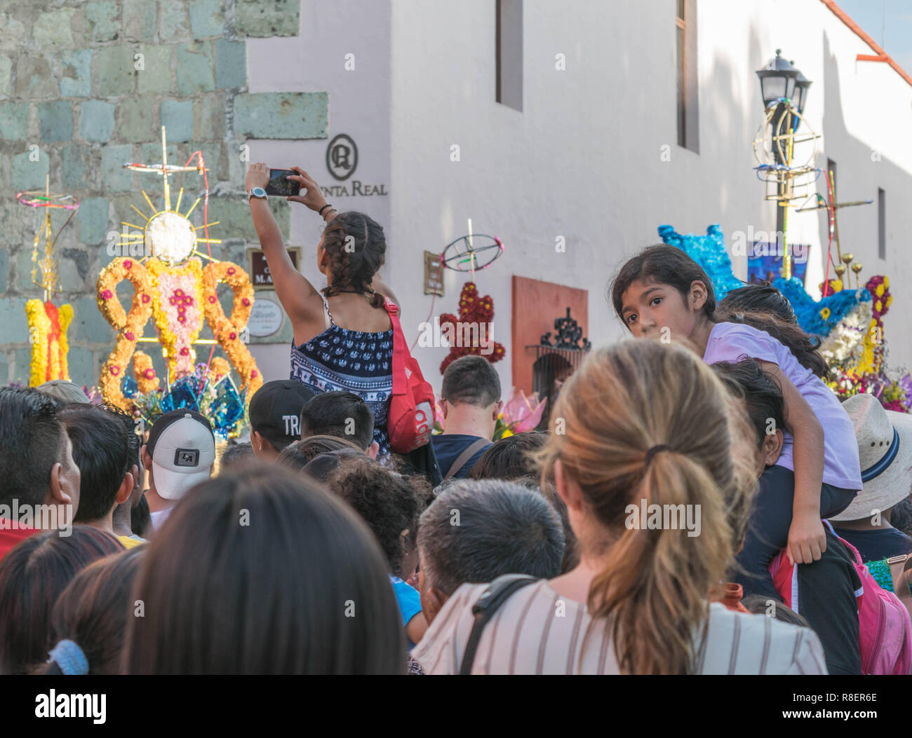 People celebrating in the streets during a Guelaguetza parade in Oaxaca ...