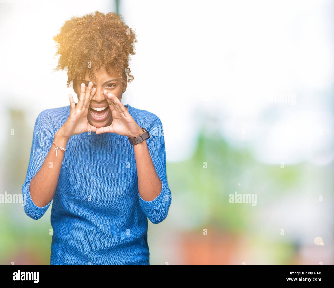 Beautiful young african american woman over isolated background ...