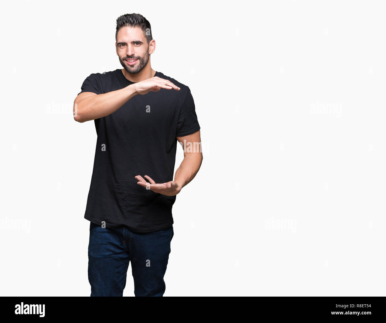 Young handsome man over isolated background gesturing with hands ...
