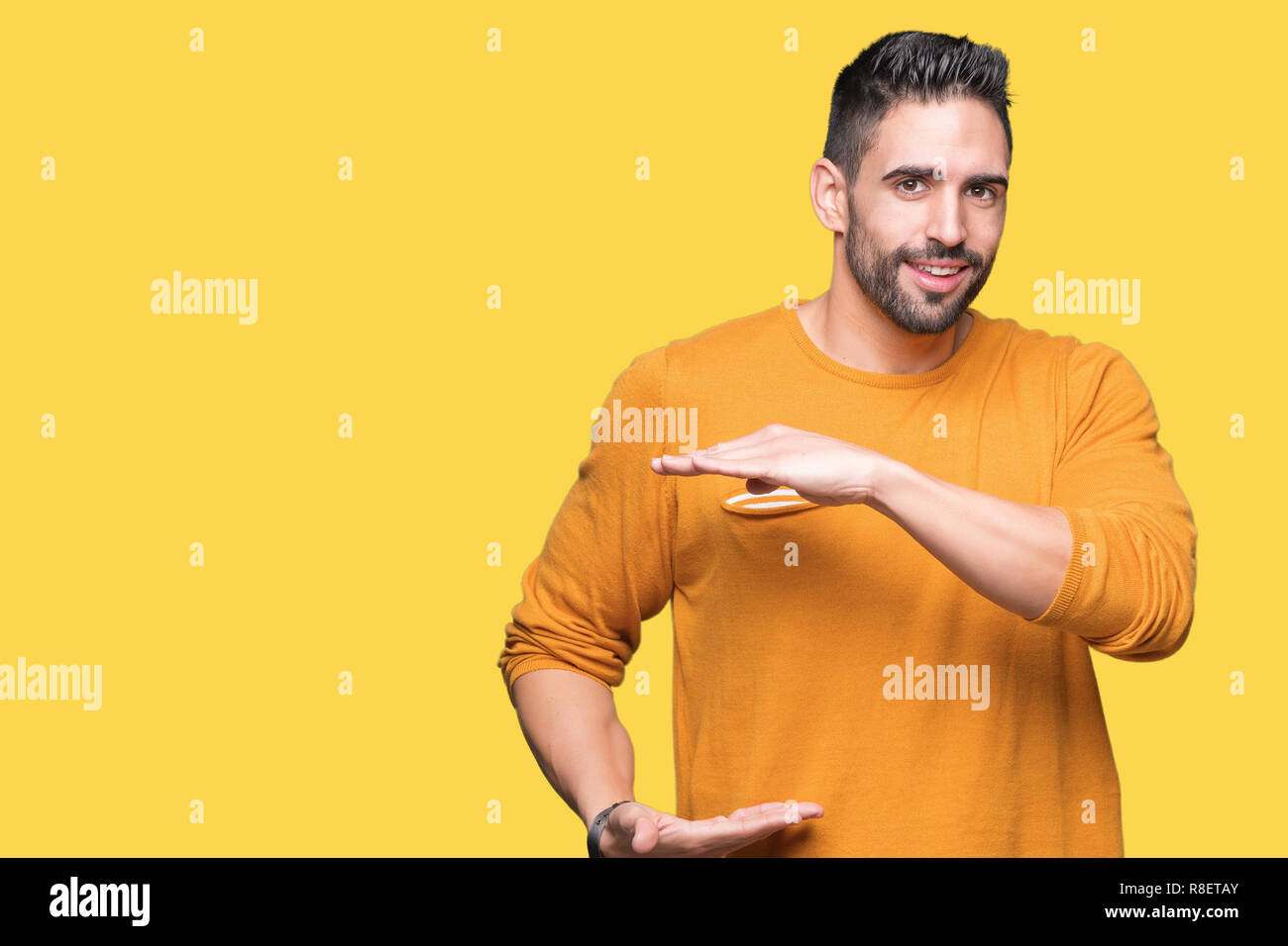 Young handsome man over isolated background gesturing with hands ...