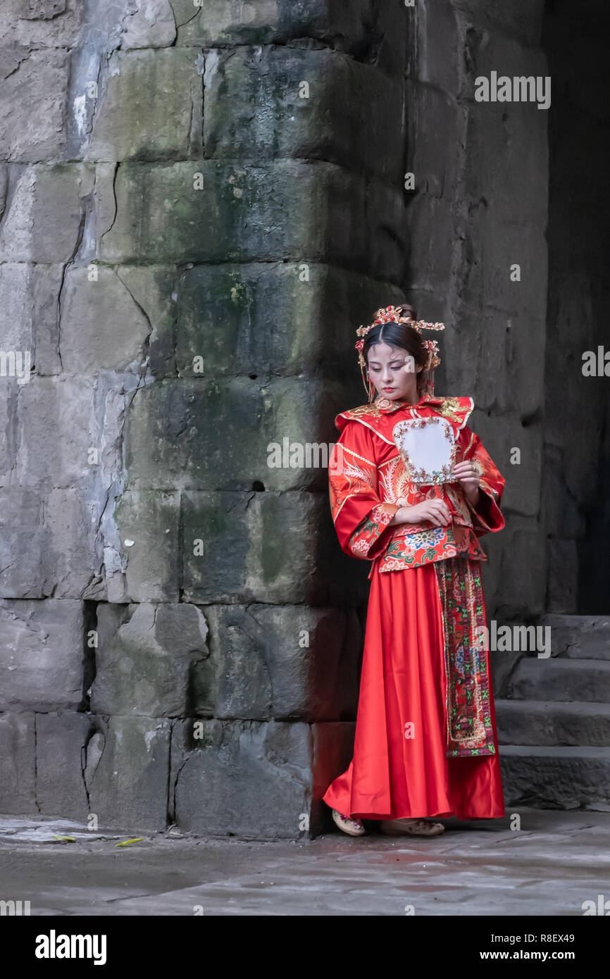 Woman in Red dress - Chinese woman in traditional costume posing in ...